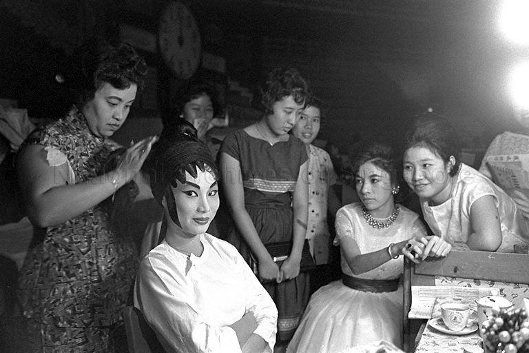 The lady (second from the right) in the photo is Ms Tsui Miu