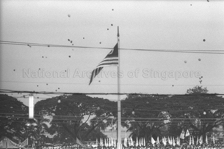 Flag raising of Malaysia flag during Malaysia Day