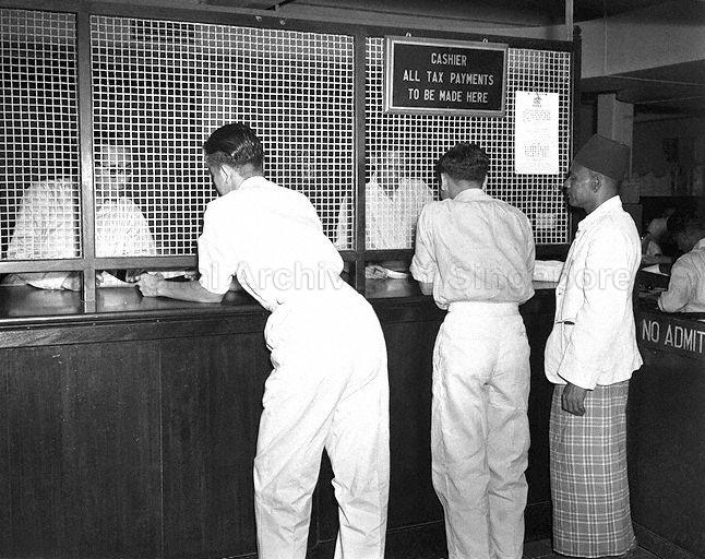 Collection of tax revenue at a tax payment booth of the