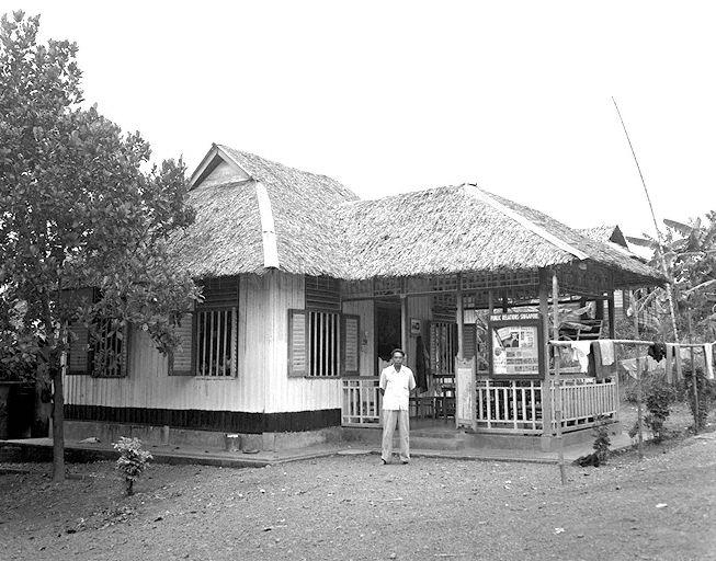 A TYPICAL ATTAP HOUSE IN A MALAY KAMPONG