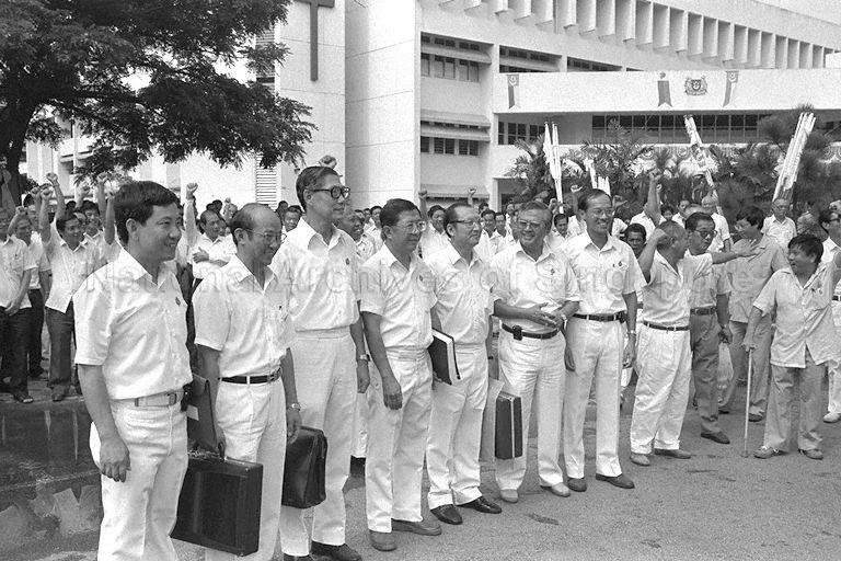 People's Action Party (PAP) candidates with supporters at