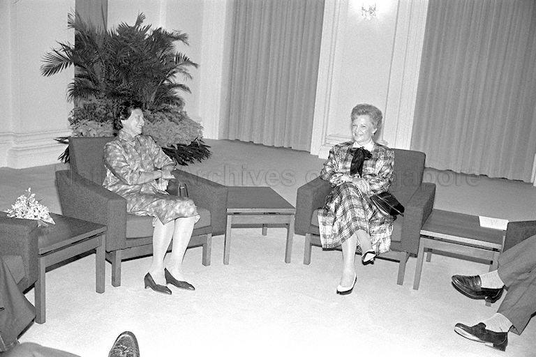 First Lady Mrs Wee Kim Wee conversing with wife of United