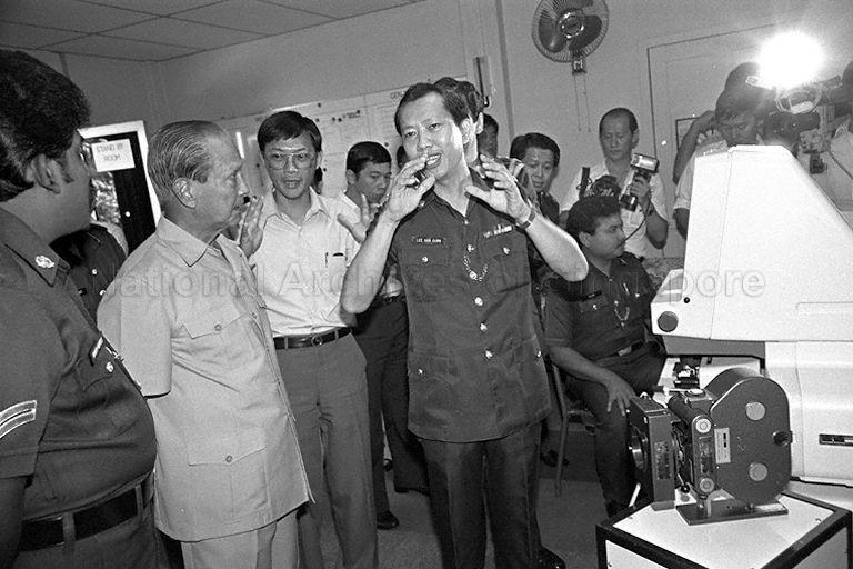 President Wee Kim Wee being briefed on the organisation and