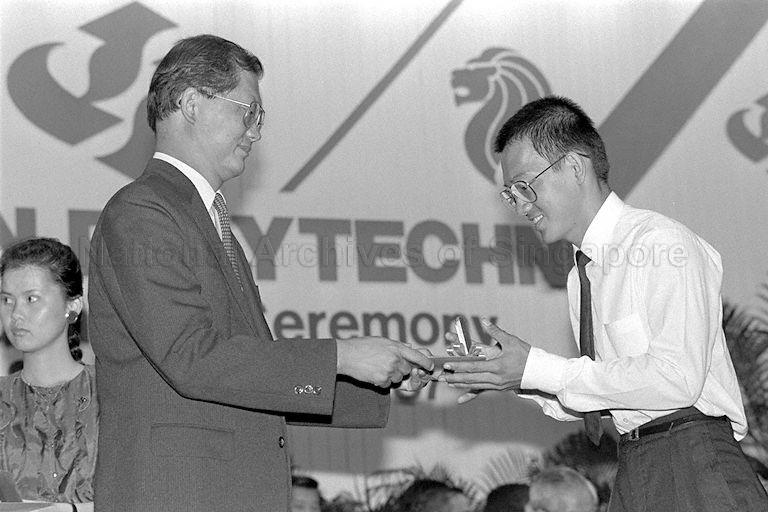 Minister of State for Education Dr Tay Eng Soon presenting