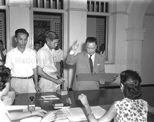 MINISTER FOR EDUCATION CHEW SWEE KEE REGISTERING AS