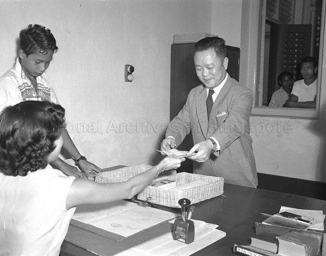 MINISTER FOR EDUCATION CHEW SWEE KEE REGISTERING AS