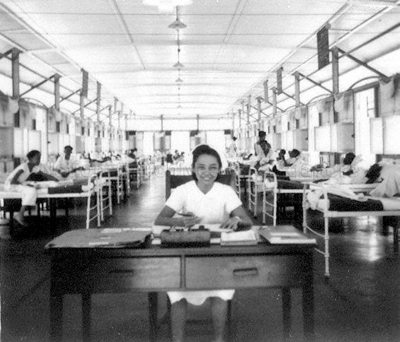 PHOTOGRAPH OF NURSE CHAN HENG YOKE ON DUTY AT WARD 'C' OF