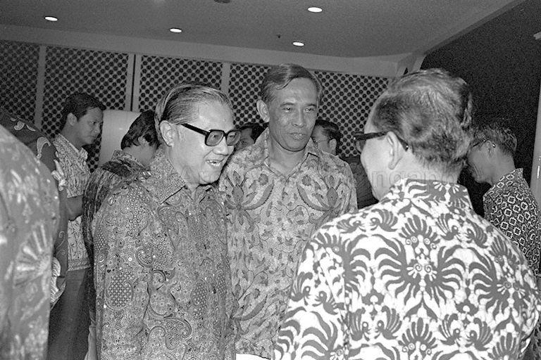 Permanent Secretary for Communications Sim Kee Boon (second