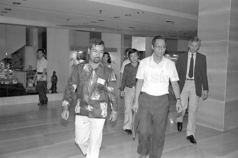 Minister without Portfolio Lim Chee Onn (centre) arriving
