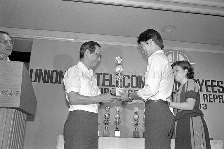 Minister without Portfolio Lim Chee Onn (left) presenting
