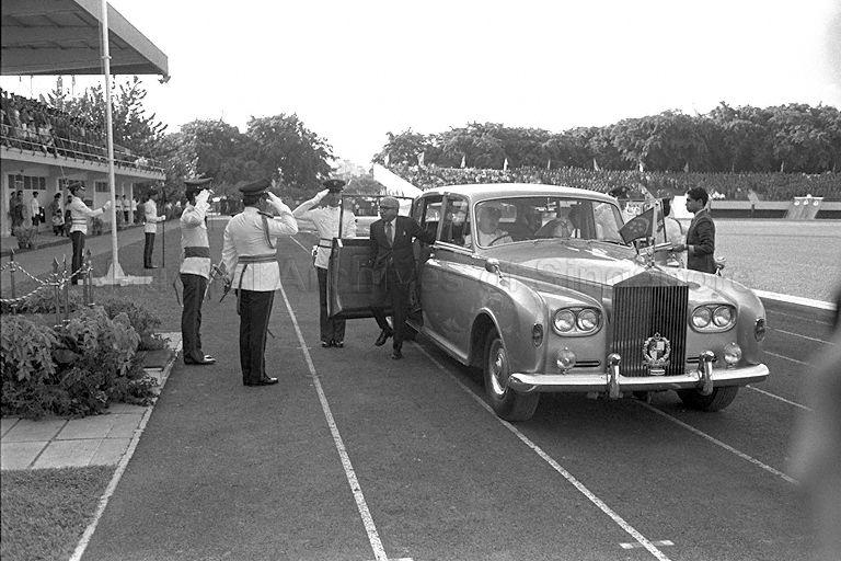 President Devan Nair arriving at Jurong Stadium for