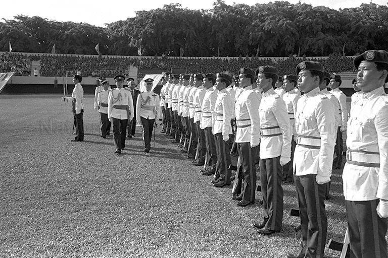 President Devan Nair inspecting the guard of honour before