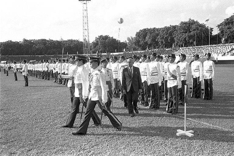 President Devan Nair inspecting the guard of honour before