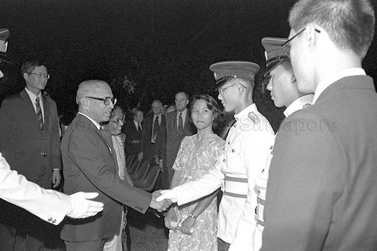 President C V Devan Nair congratulating President's Scholar