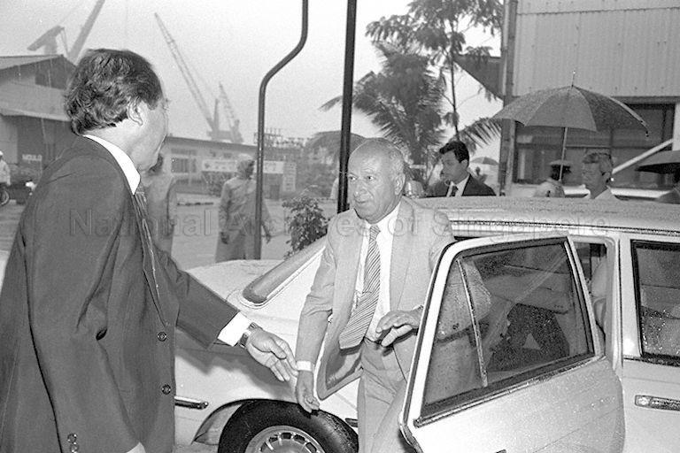 Turkish Prime Minister Bulend Ulusu (centre) arriving to