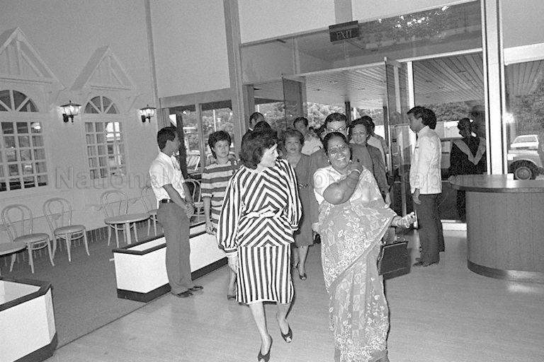 First Lady Mrs C V Devan Nair (foreground, right) arriving