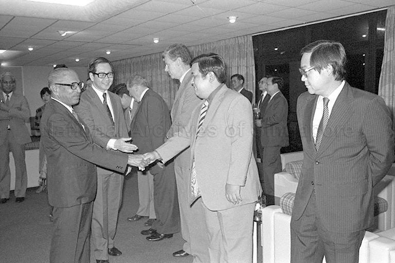 President Devan Nair being greeted upon arrival for the