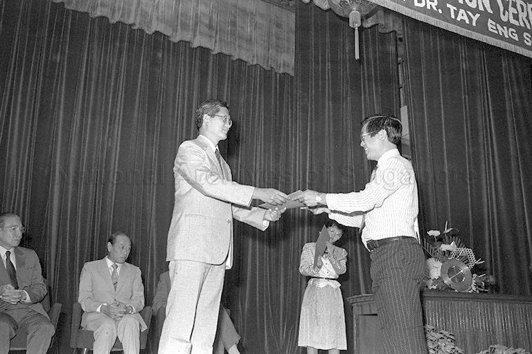 Minister of State for Education Dr Tay Eng Soon presenting