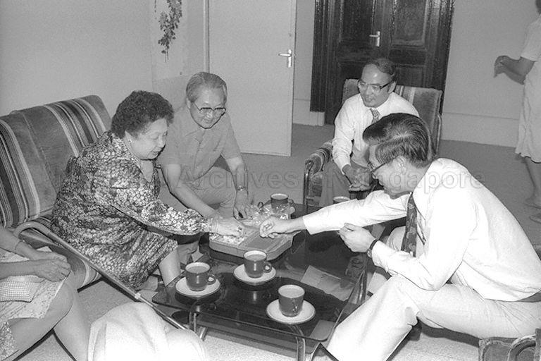 Mrs Daisy Lim Pang (left) showing Minister for
