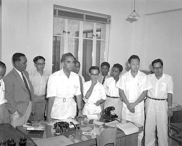From left, Liberal-Socialists' Lim Choon Mong (first, partly