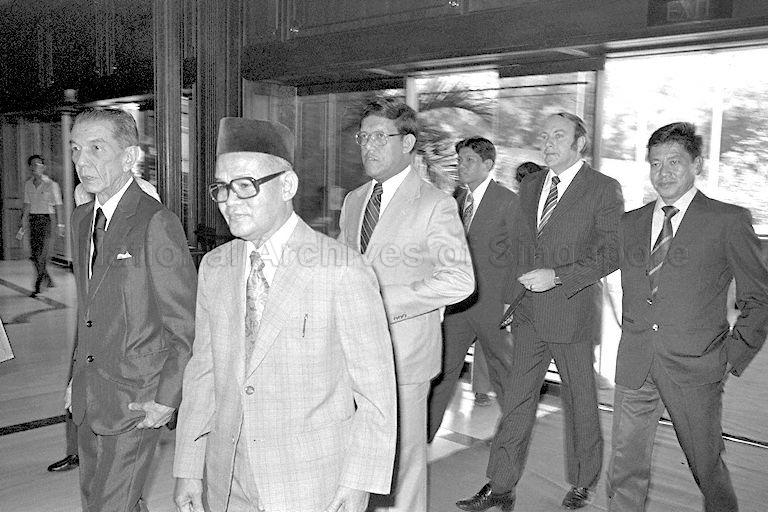 President Dr Benjamin Sheares is escorted by President of