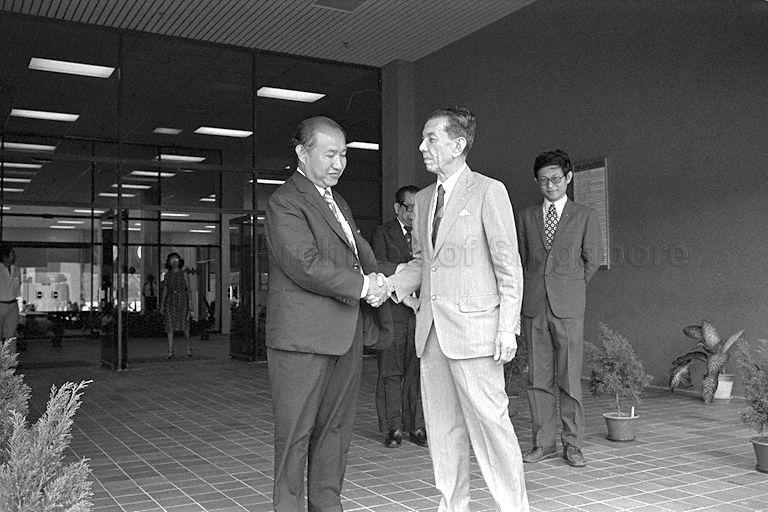 President Dr Benjamin Sheares (right) bids farewell to