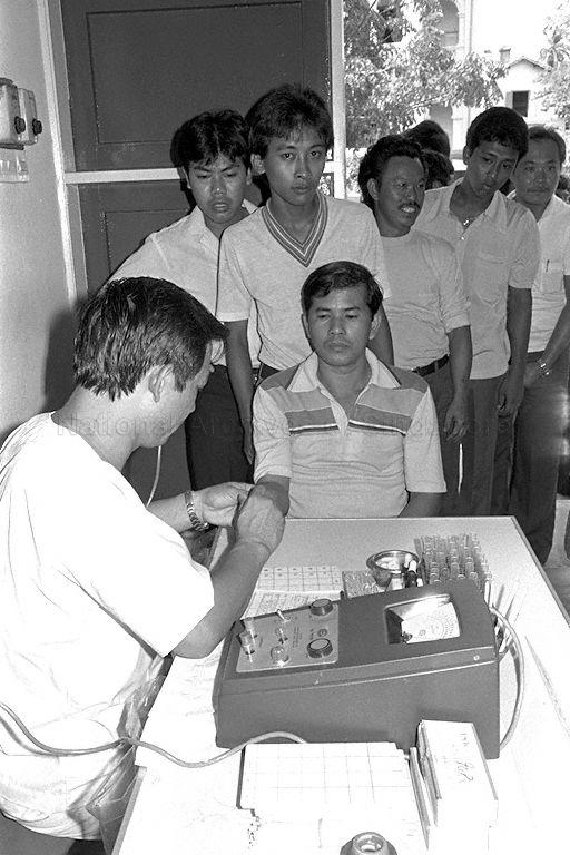 Donors queueing to do the pre-donation screening test at