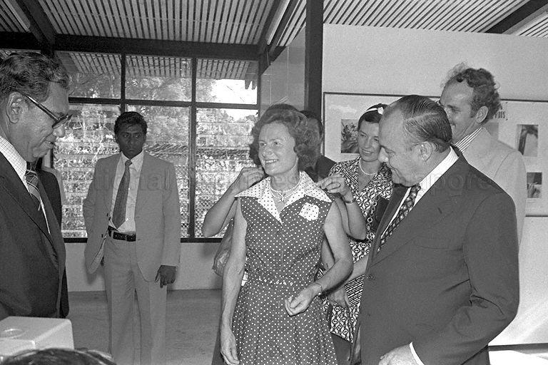 Mrs Thea Dale Muldoon being presented with a gold-plated