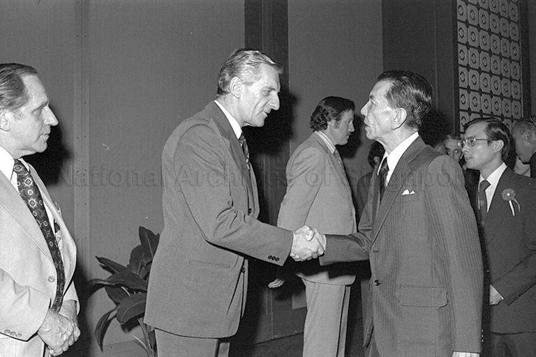 President Dr Benjamin Sheares being greeted at the banquet