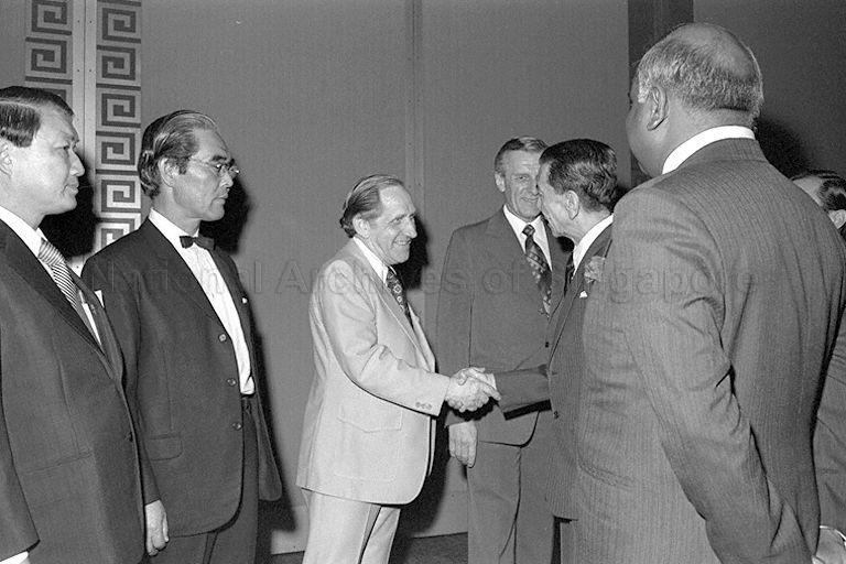 President Dr Benjamin Sheares being greeted at the banquet
