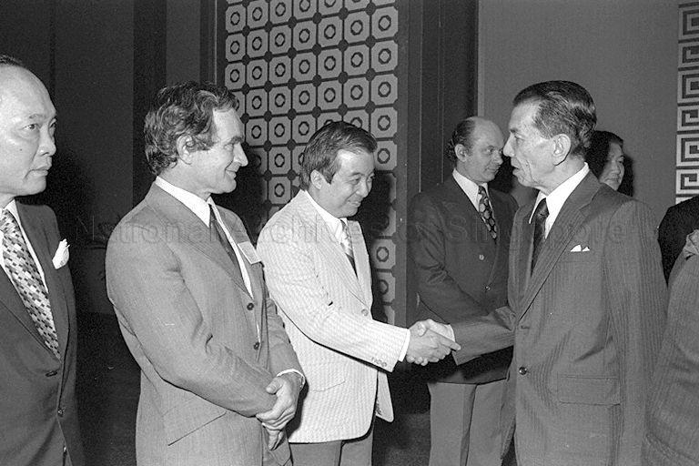 President Dr Benjamin Sheares being greeted at the banquet