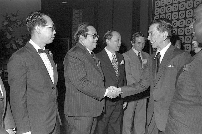 President Dr Benjamin Sheares being greeted at the banquet