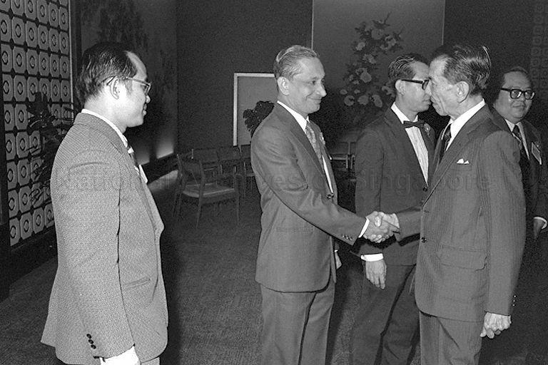 President Dr Benjamin Sheares being greeted at the banquet