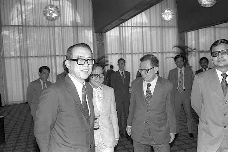 Minister for Finance Hon Sui Sen (foreground, left) arriving