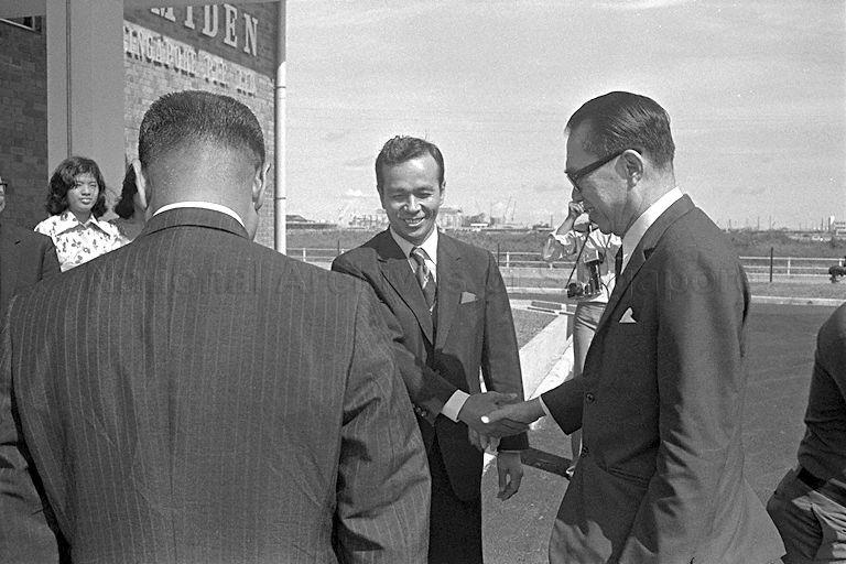 Minister for Finance Hon Sui Sen being greeted when he