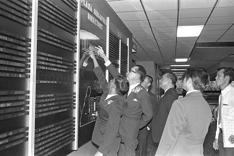 Minister for Finance Hon Sui Sen reviewing the mall's