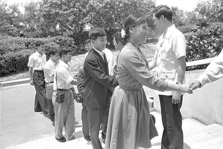 Kwangchow Acrobatic Troupe of China arriving for lunch