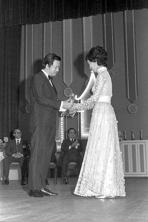Hong Kong star Lily Ho receiving an award at closing