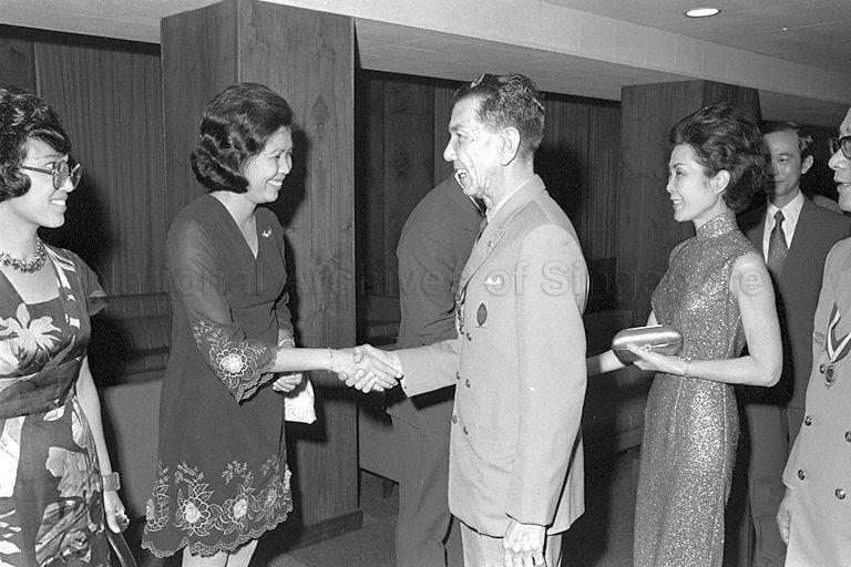 President Dr Benjamin Sheares and First Lady going through a