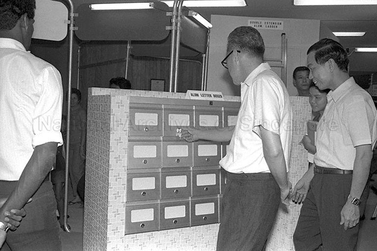 Prime Minister Lee Kuan Yew viewing mailboxes at "Made in