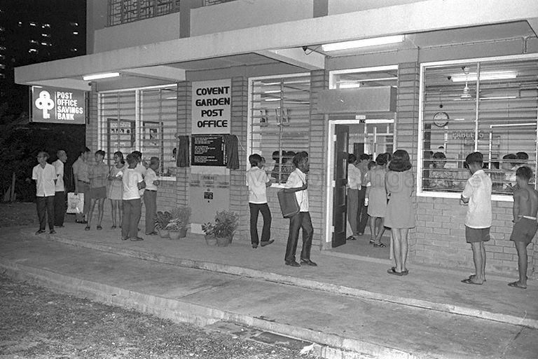 View of users at Covent Garden Post Office in Zion Road