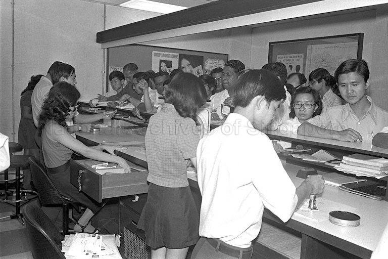 View of users and counter staff at Colombo Post Office at