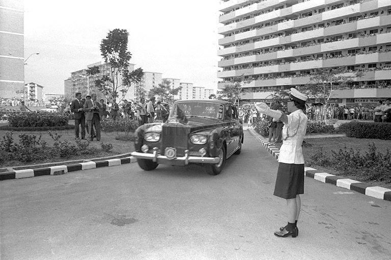 Motorcade of Queen Elizabeth II arriving at Toa Payoh Lorong