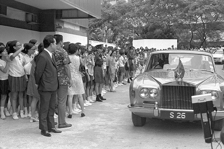 Motorcade of Princess Anne arriving at Cathay Building
