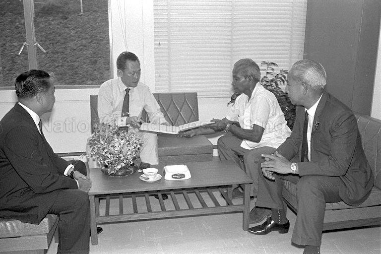 Prime Minister Lee Kuan Yew with officials of the