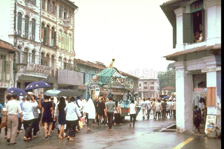 Chinese funeral procession along Middle Road, near the