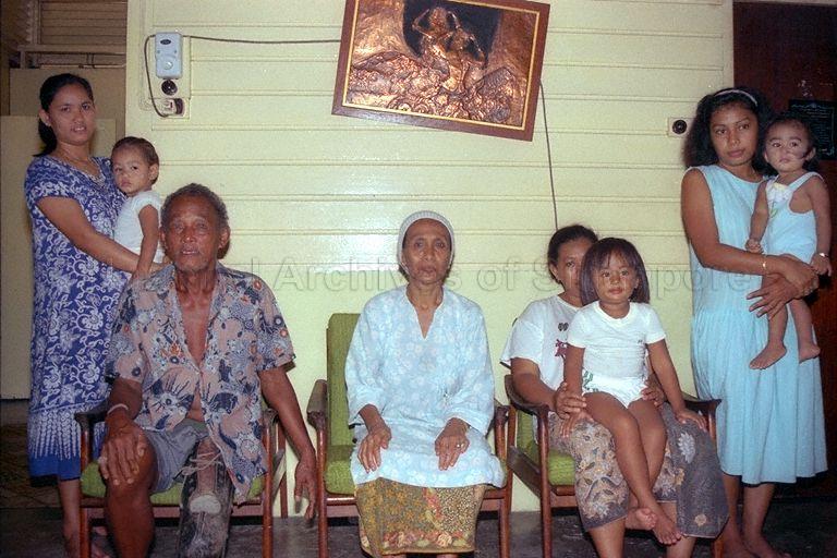GROUP PHOTOGRAPH OF AWANG ABDULLAH (SEATED LEFT) WITH FAMILY
