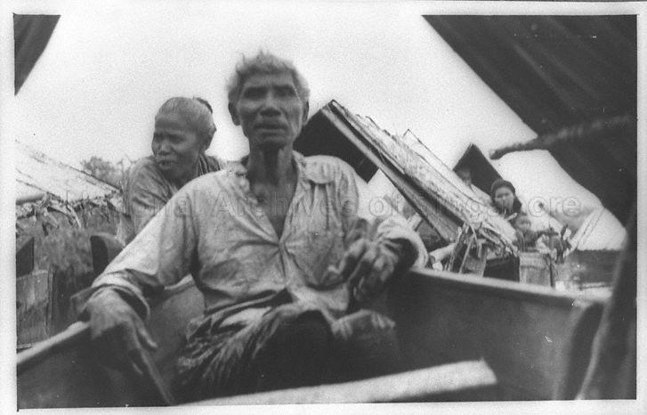Orang Laut (Sea People) families on board their houseboats