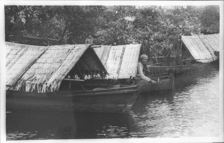 Orang Laut (Sea People) on board their houseboats kown as
