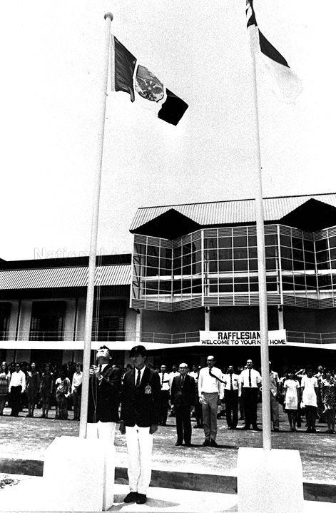 Students and staff of Raffles Institution assembling at the